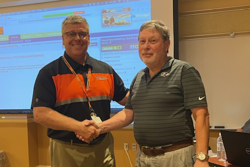 Board member recognized for service